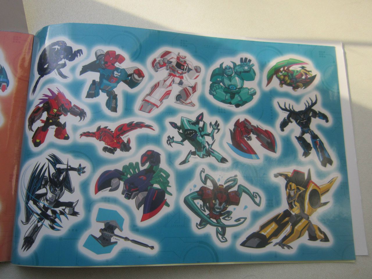 Robots in Disguise Sticker Books in Russia - Transformers News - TFW2005